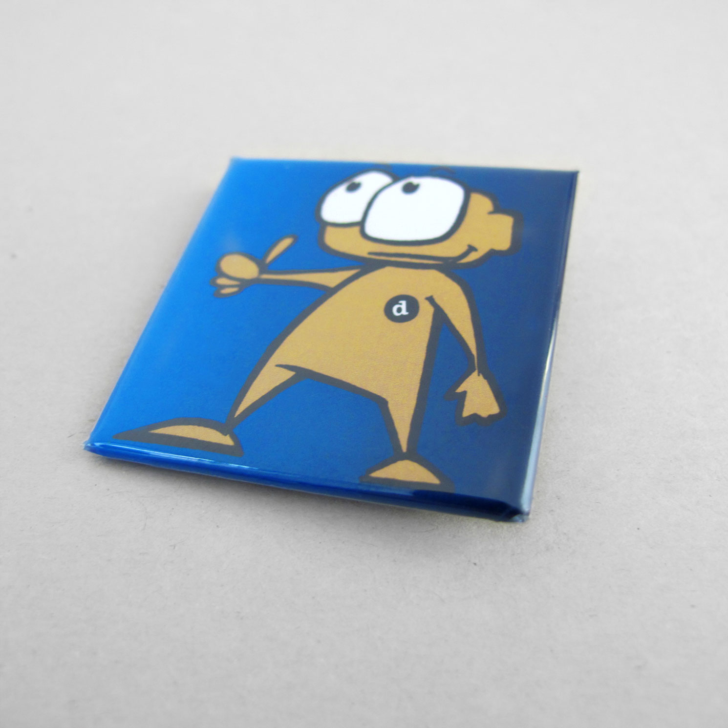 Der quadratische Magnetbutton in 40x40mm mit Deinem Motiv.